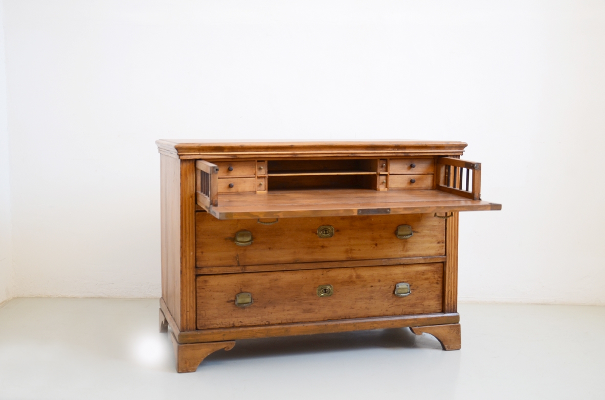 Austrian 1830's chest of drawers in light pine wood. 1st drawer with ...